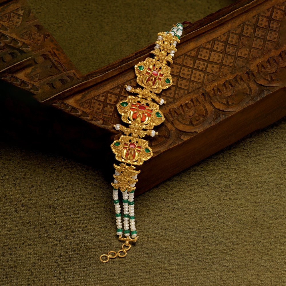 Buy Stately Coral Stone Bracelet at Best Price | Tanishq US