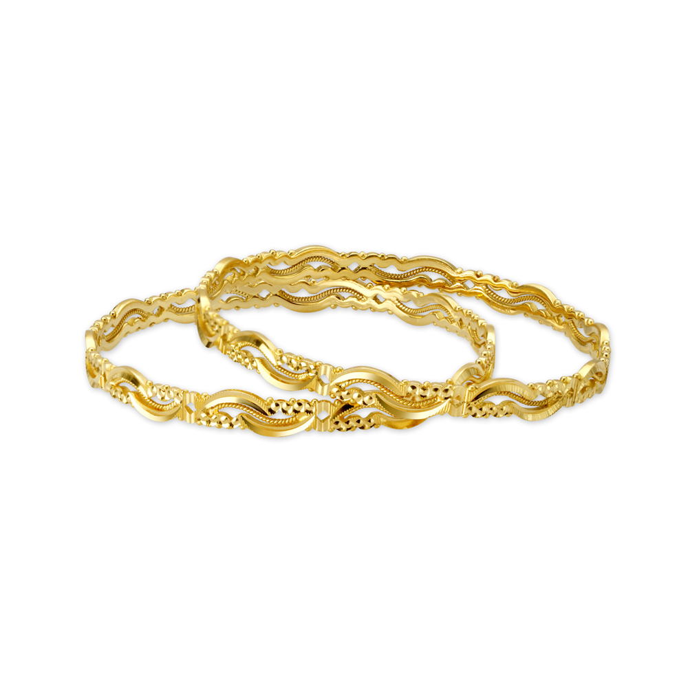 Buy Enchanting Yellow Gold Carved Bangles at Best Price | Tanishq US