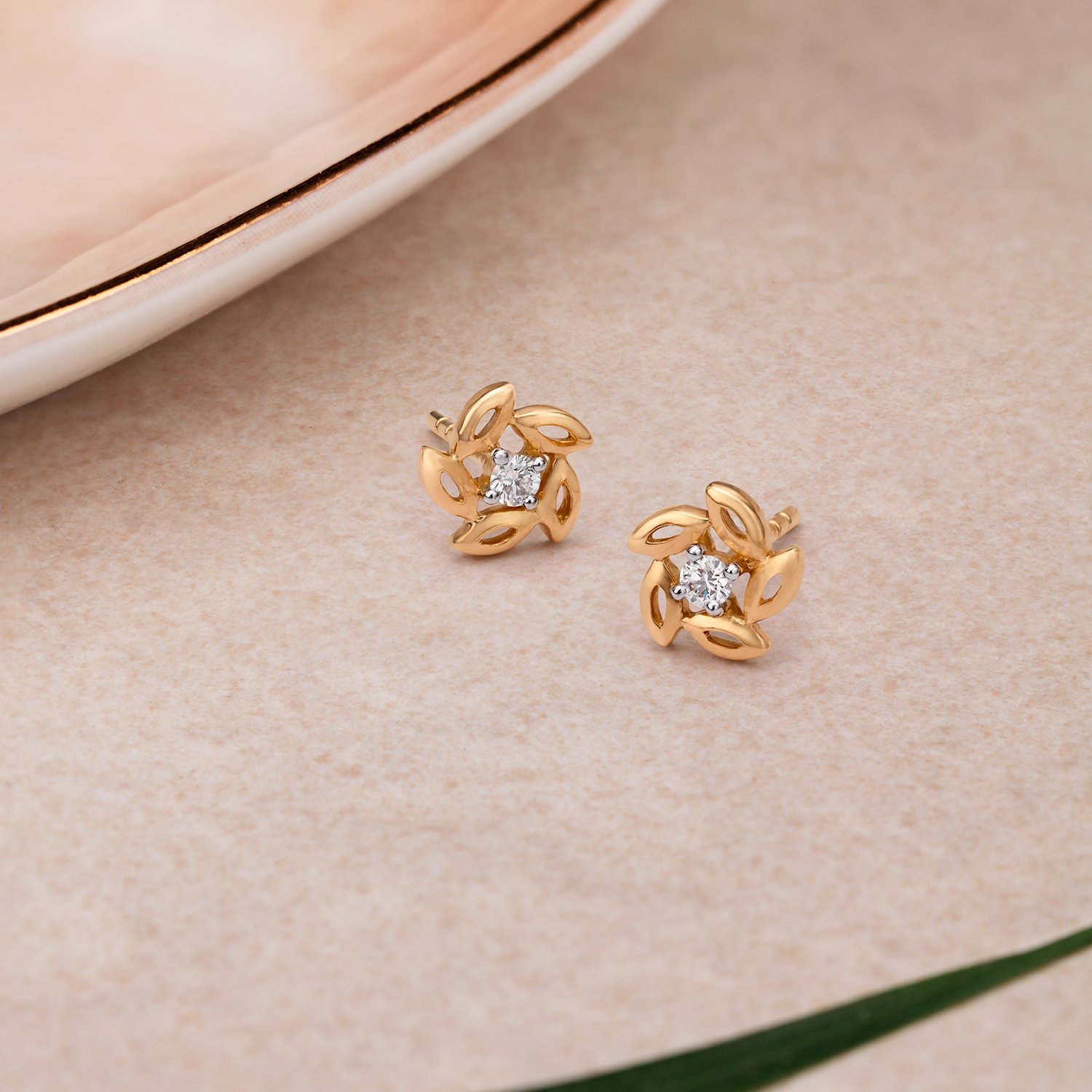 Buy Dainty Floral Gold and Diamond Stud Earrings at Best Price Tanishq US